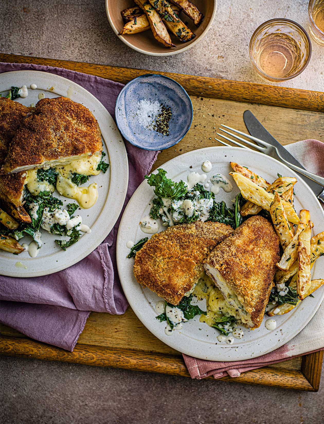 Parma chicken schnitz with cheesy kale and celeriac fries recipe ...