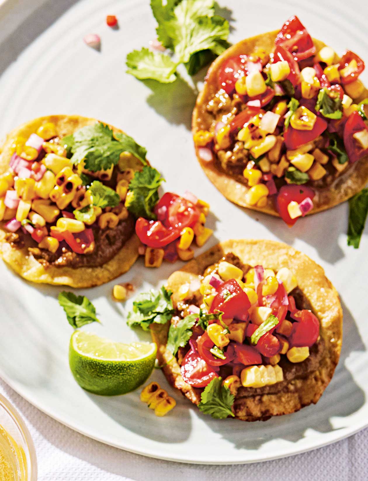 Charred corn and tomato tostadas with smoked mussel purée recipe ...