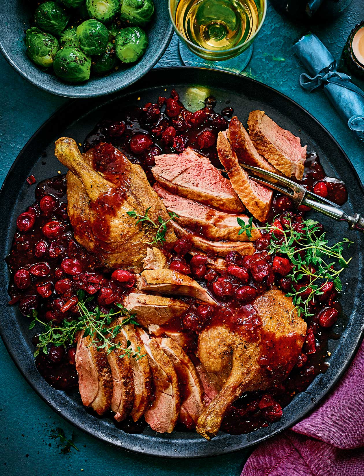 Cranberry and balsamic spatchcock duck recipe | Sainsbury`s Magazine
