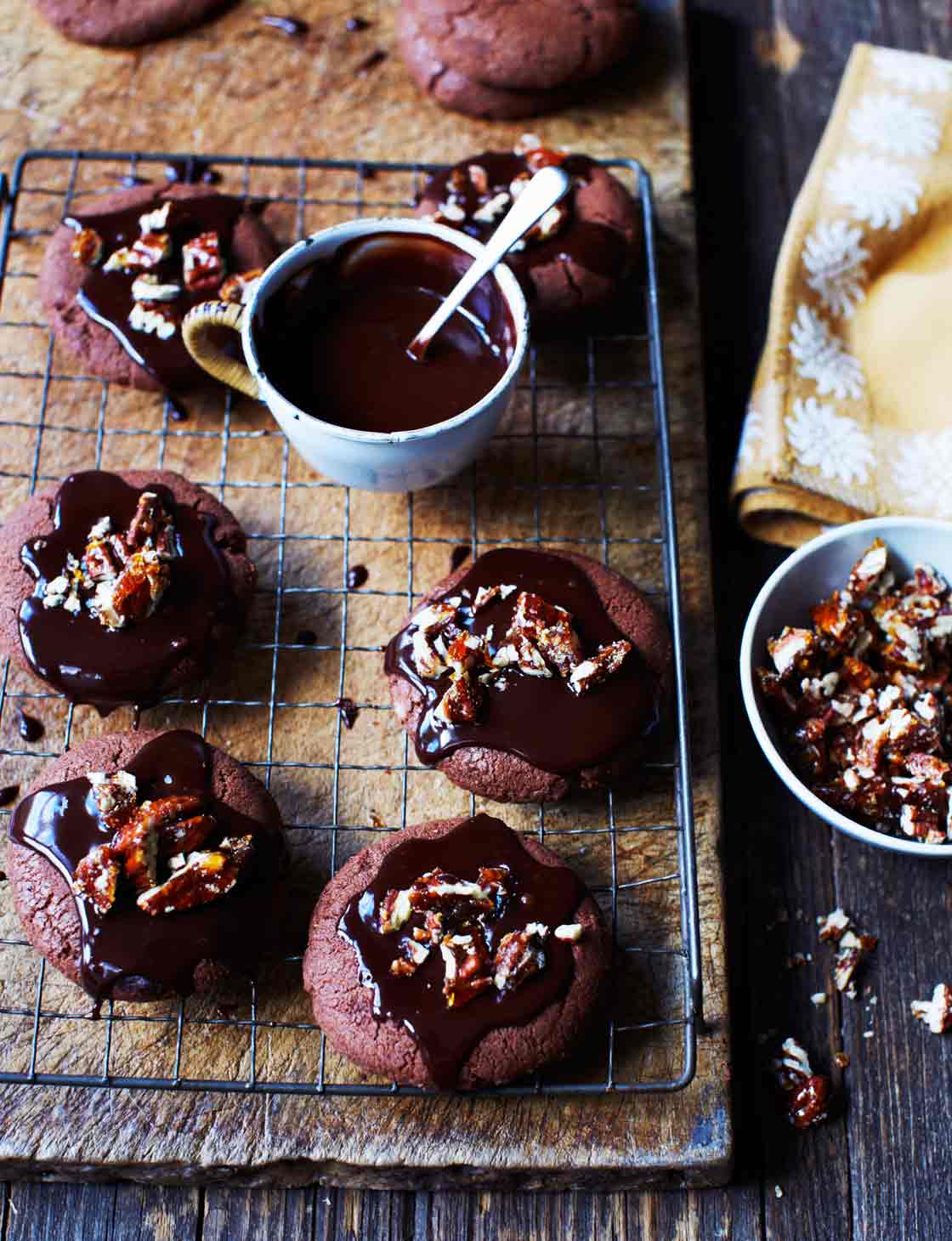 Decadent chocolate cookies with chocolate ganache and candied pecans ...