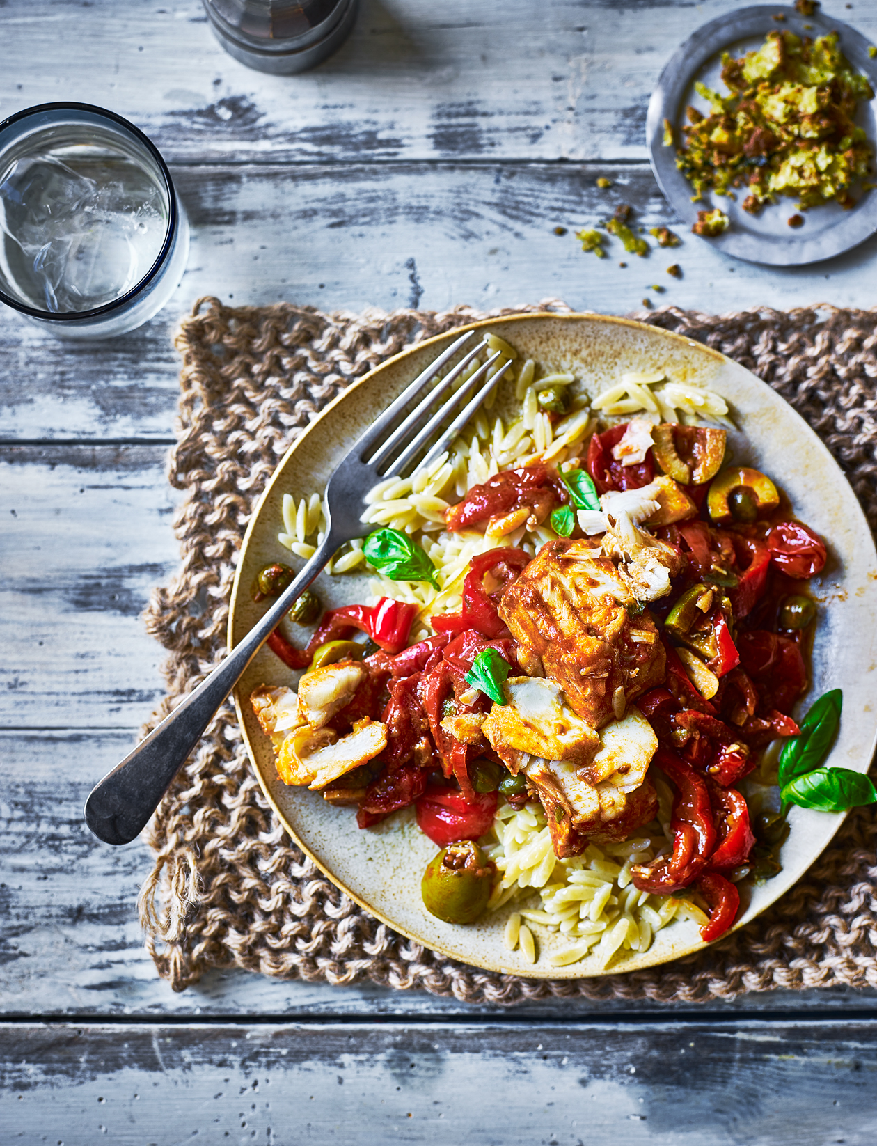 Mediterranean cod with tomato and red peppers recipe | Sainsbury`s Magazine