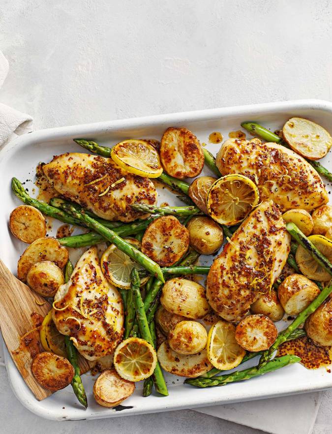 Maple mustard chicken traybake recipe | Sainsbury's Magazine